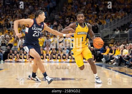 UConn forward Jayden Ross (23) shoots against Michigan State forward ...