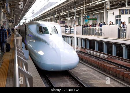 A Shinkansen N700 series bullet train at Shin Osaka station in Japan ...