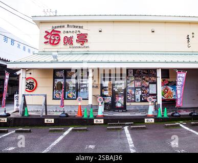 Entrance to a Japanese seafood restaurant at the port of Numazu in ...