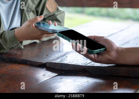 Smartphone sending and receiving data Stock Photo - Alamy