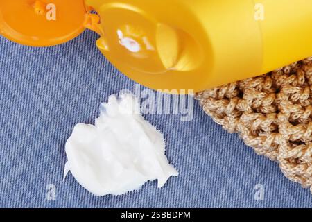 Spilled sunscreen from a yellow tube on clothes Stock Photo - Alamy