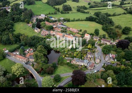 Aerial view Lealholm Village alongside the River Esk, North York Moors ...