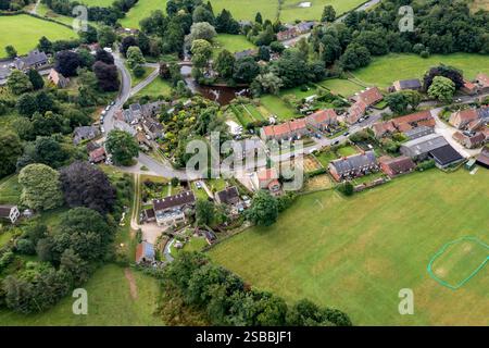 Aerial view Lealholm Village alongside the River Esk, North York Moors ...