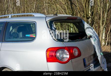 Rear window of a car smashed due to vandalism symbol image Stock Photo ...