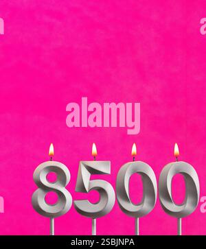 Candle number 8500 - Number of followers or likes Stock Photo - Alamy