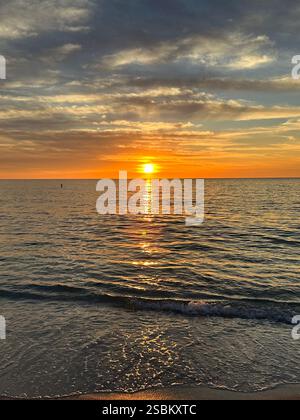 Sunset on a beach in Sarasota, Florida, usa Stock Photo - Alamy