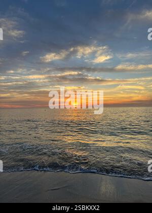 Sunset on a beach in Sarasota, Florida, usa Stock Photo - Alamy