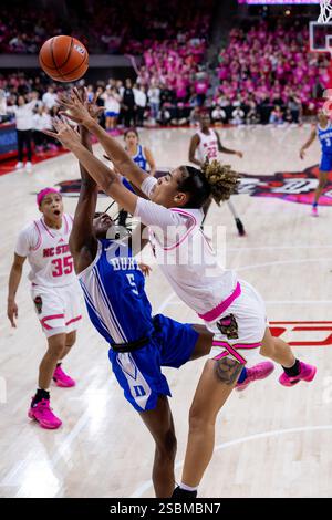 NC State's Madison Hayes (21) controls the ball near Michigan State's ...