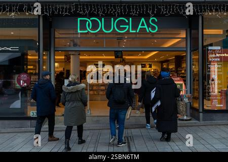 Douglas shop flag sign, illuminated store logo. Douglas is the largest ...
