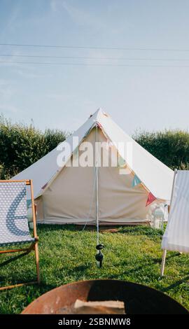 A white tent in a green garden on a sunny day Stock Photo - Alamy