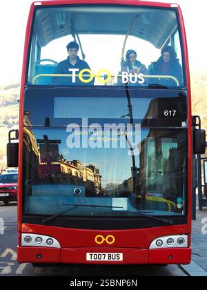 Front view of Toot Bus guided city tours bus as tourists board, with ...