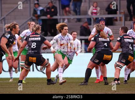 Harlequins Women’s Ellie Kildunne runs at Exeter Chiefs Women’s Katie ...