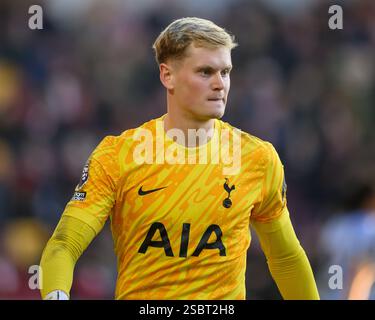 Tottenham Hotspur goalkeeper Antonin Kinsky (right) saves at the feet ...
