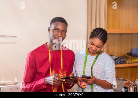 happy tailor holding tape rule isolated over white background Stock ...