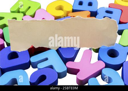 Colored wooden letters of the English alphabet on a white background ...