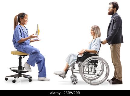 Young doctor with skeleton isolated on white Stock Photo - Alamy