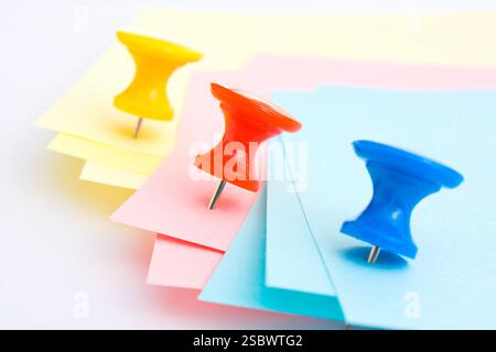 sheets pinned buttons Stock Photo - Alamy