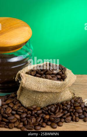 Coffee beans spilled out of the bag Stock Photo - Alamy