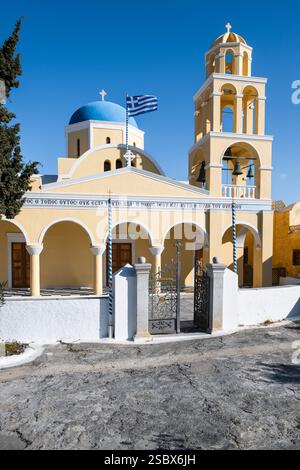 Portico of a church in Oia Santorini with black and white checkerboard ...