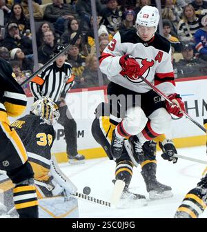 Pittsburgh Penguins goaltender Alex Nedeljkovic makes a save during the ...