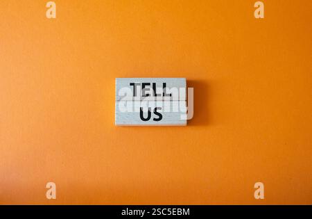Tell us symbol. Concept words Tell us on white chalk background ...