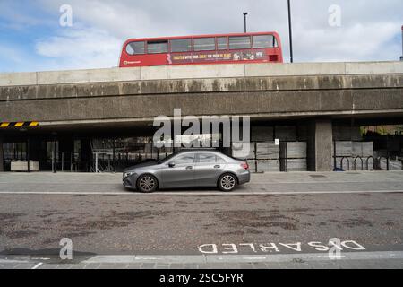 Grey Mercedes parked under a bridge at a disabled parking bay in Abbey ...