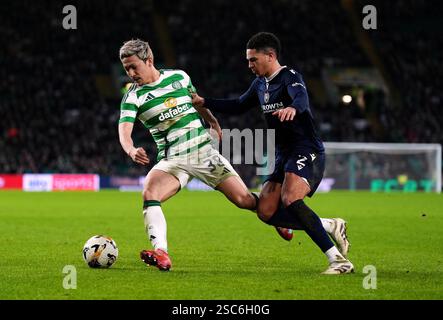 Celtic's Daizen Maeda and Dundee's Ethan Ingram (right) battle for the ...