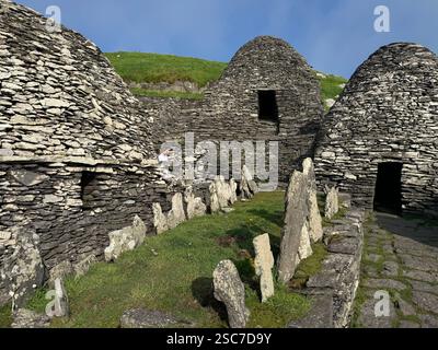 Monks graveyard with beehive monastic cells on Skellig Michael, County ...