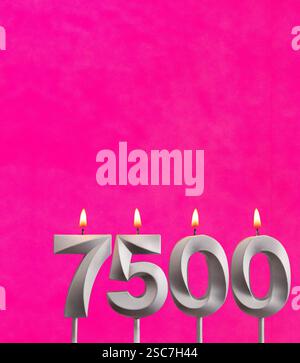 Candle number 7500 - Number of followers or likes Stock Photo - Alamy