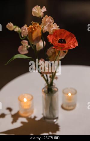 Round candles, beautiful table setting close up Stock Photo - Alamy