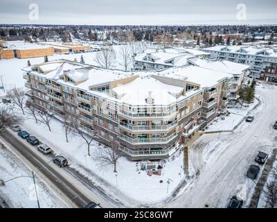 An aerial view of a large white contemporary house in geometric shapes ...