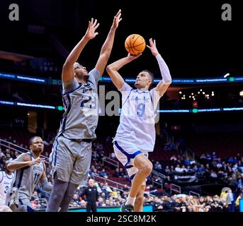 Butler center Andre Screen (23) swats away a shot by St. John's guard ...