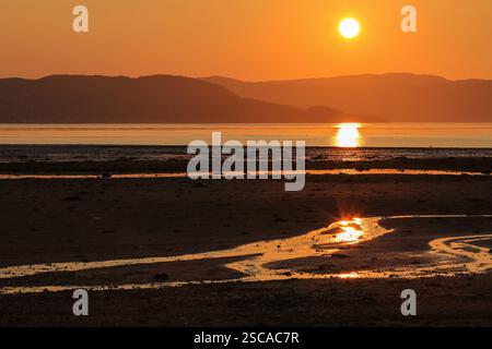 Low tide at Trondheim fjord and sandy beach Oesand located near the ...