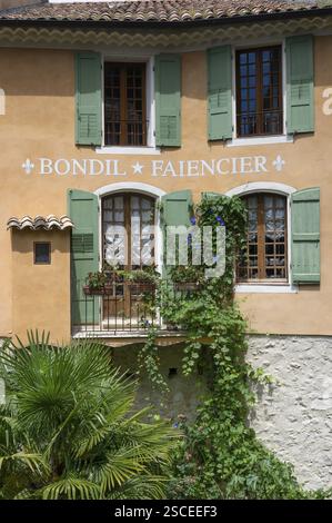 The sunny yellow facade of Bondil, one of the most famous faience ...