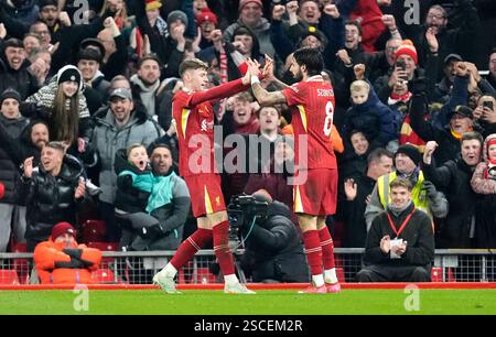 Liverpool's Dominik Szoboszlai, second right, celebrates after scoring ...