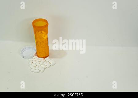 Front view of container with pills and copy space Stock Photo - Alamy