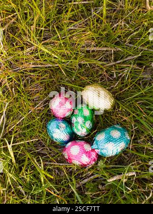Close up of an assortment of chocolate Easter eggs on a rustic wooden background Stock Photo - Alamy
