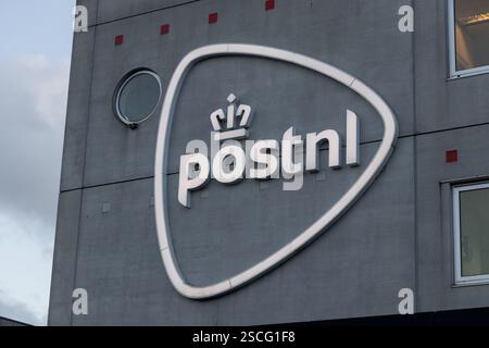 Postnl logo sign at pakket punt. The national and biggest postal ...