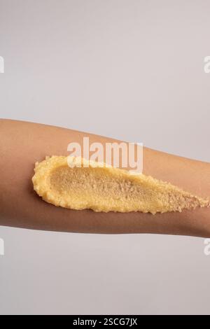 An orange smudge of scrub on a hand Stock Photo - Alamy