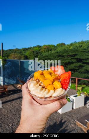 Acai bowl on the blue wooden table Stock Photo - Alamy