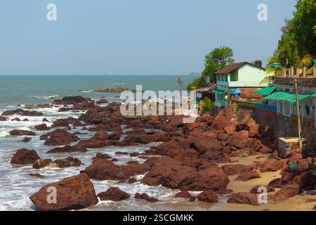 Arambol beach, stones, houses, North Goa, India Stock Photo - Alamy