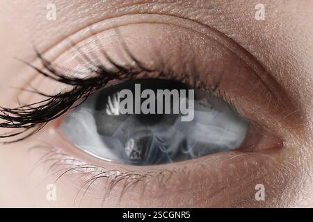 Hypnosis. Hypnotic smoke in woman's eye, closeup Stock Photo - Alamy