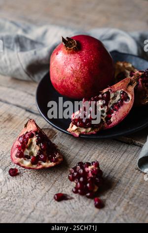 Close up of red opened pomegranate isolated on a white background Stock ...
