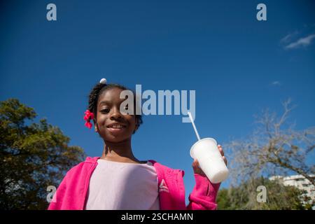 happy teen girl wear pink shirt. Child face, horizontal poster ...