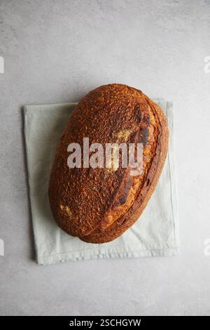 Freshly baked traditional bread and green poting Stock Photo - Alamy