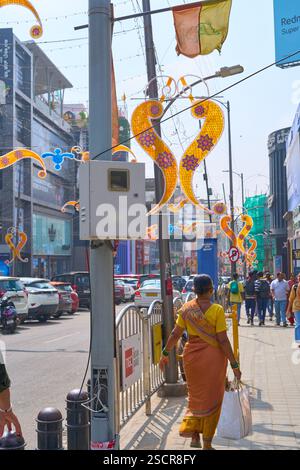 A vibrant street scene in Bangalore, India, featuring colorful ...