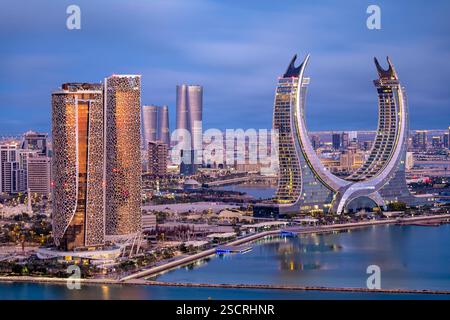 Katara buildings view from Lusail Marina Park. Crescent Tower Raffles ...
