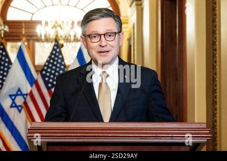 Speaker of the House Mike Johnson, R-La., joined at left by Rep. Lisa ...
