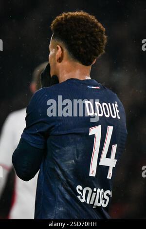 Paris Saint-Germain's Desire Doue (left) celebrates scoring the winning ...