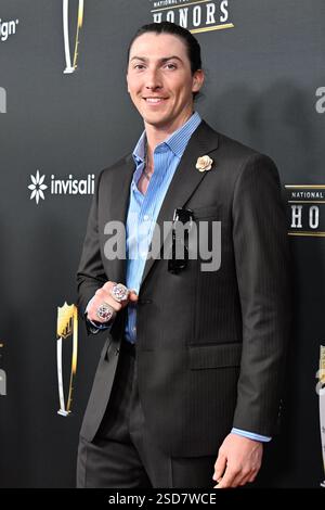 Phoebe Schecter poses on the red carpet at the NFL Honors award show ...